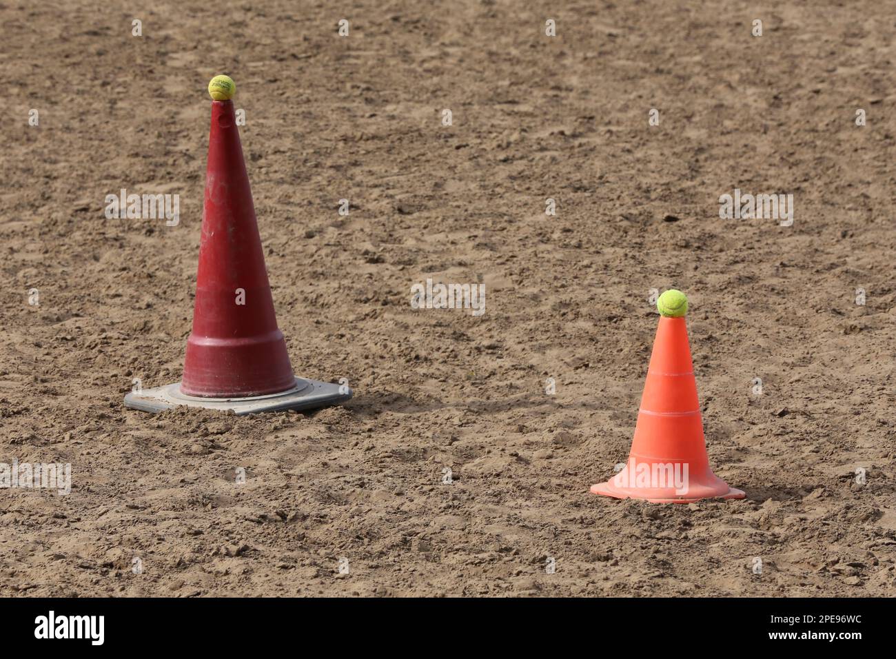 Obstacles and buoys in the sand in an empty equestrian center Stock ...
