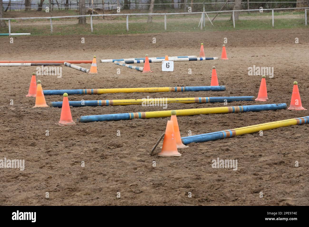 Obstacles and buoys in the sand in an empty equestrian center Stock ...