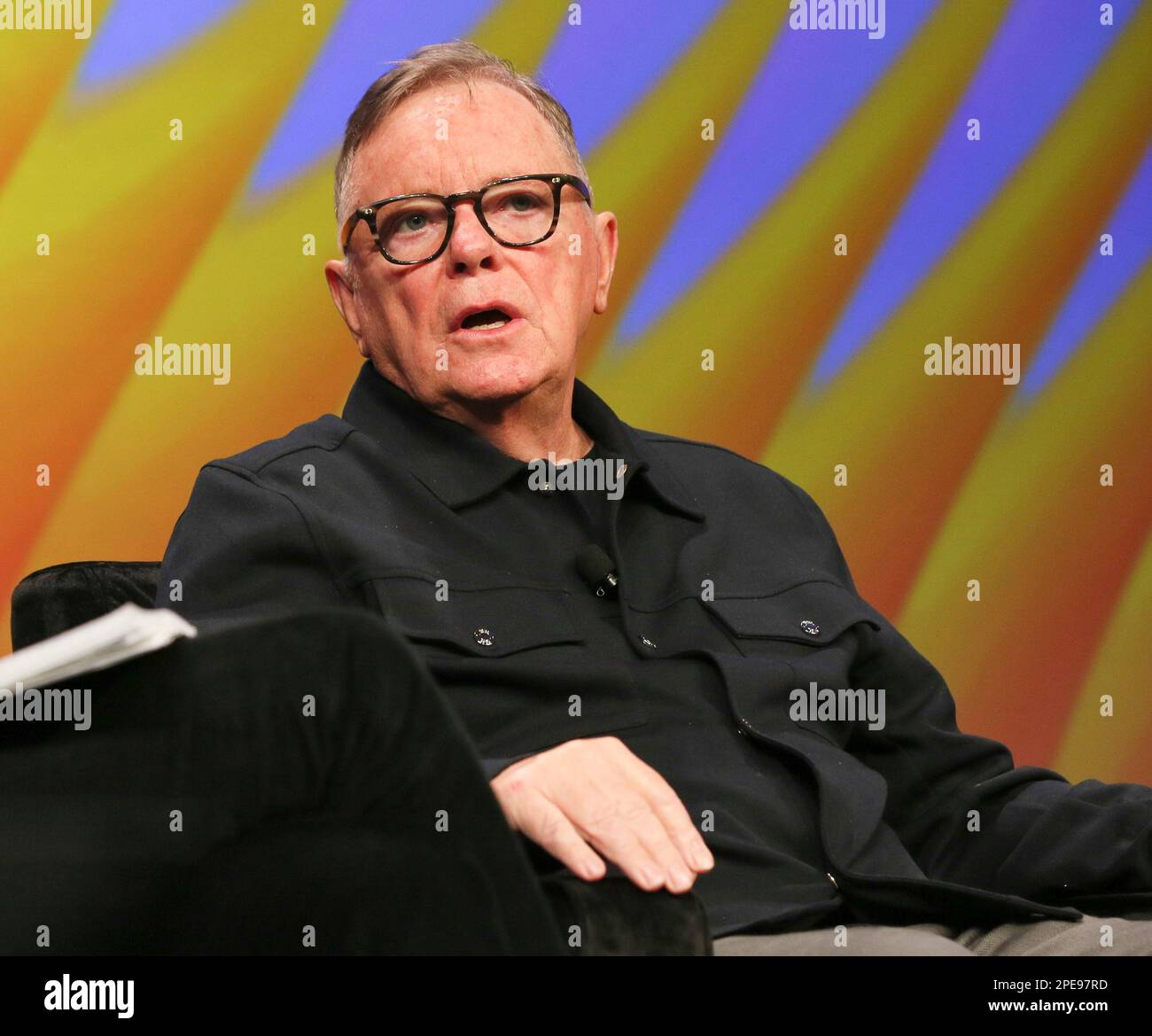 New Order member Bernard Sumner speaks during a keynote at the South by ...