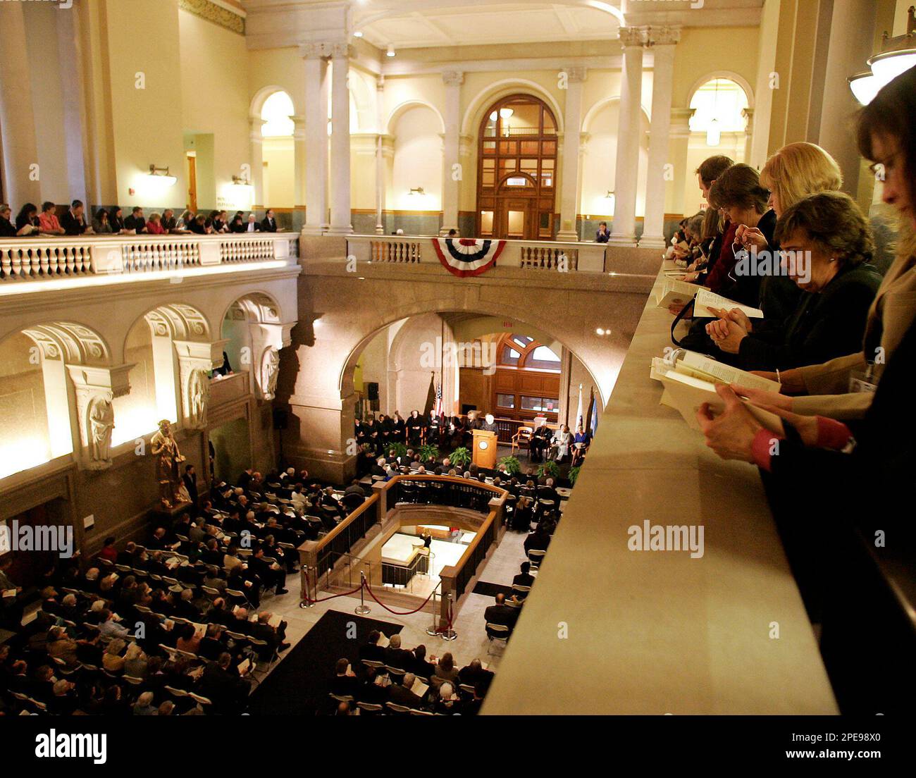 Guests listen during the dedication of the historic and newly renovated ...