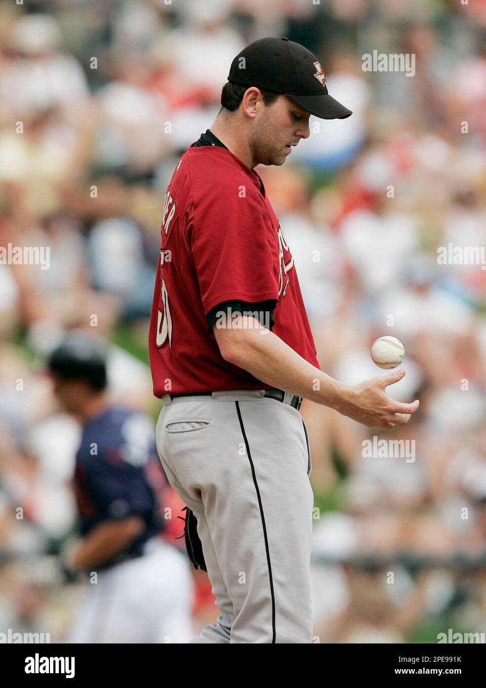 Houston Astros pitcher Dan Wheeler tosses around the baseball after ...