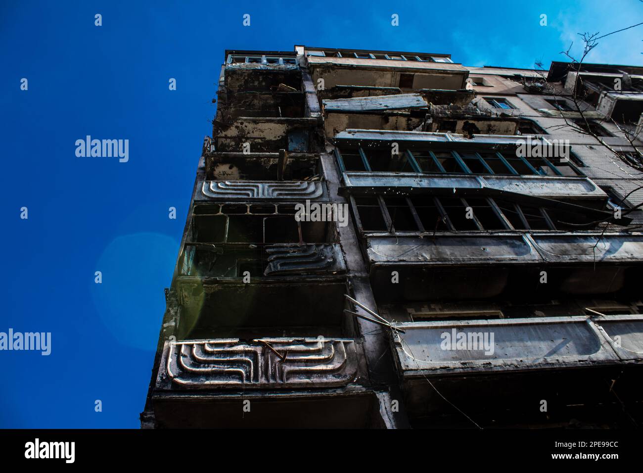 Close-up of the windows of the facade of a building that burned after ...