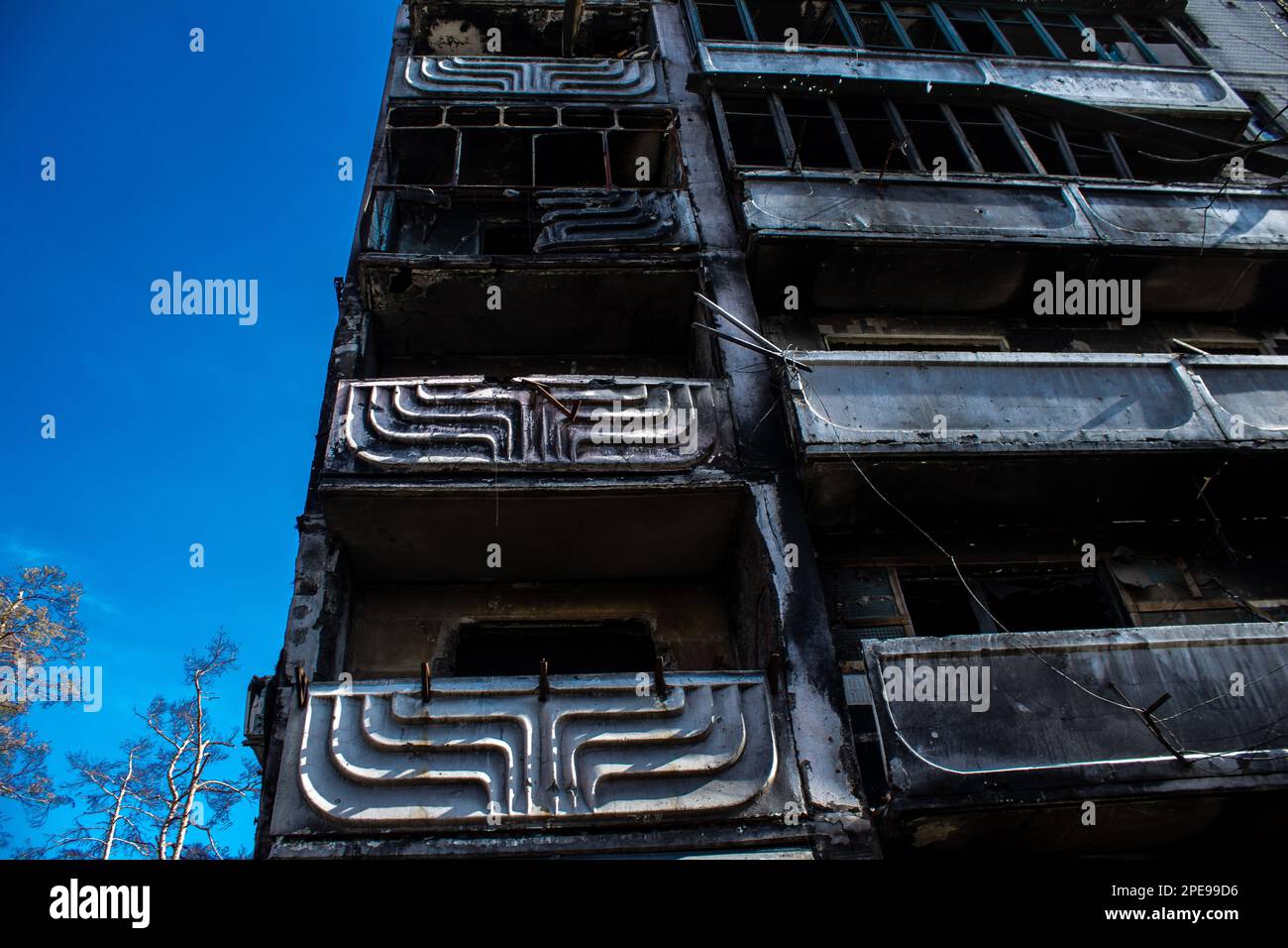 Close-up of the windows of the facade of a building that burned after ...