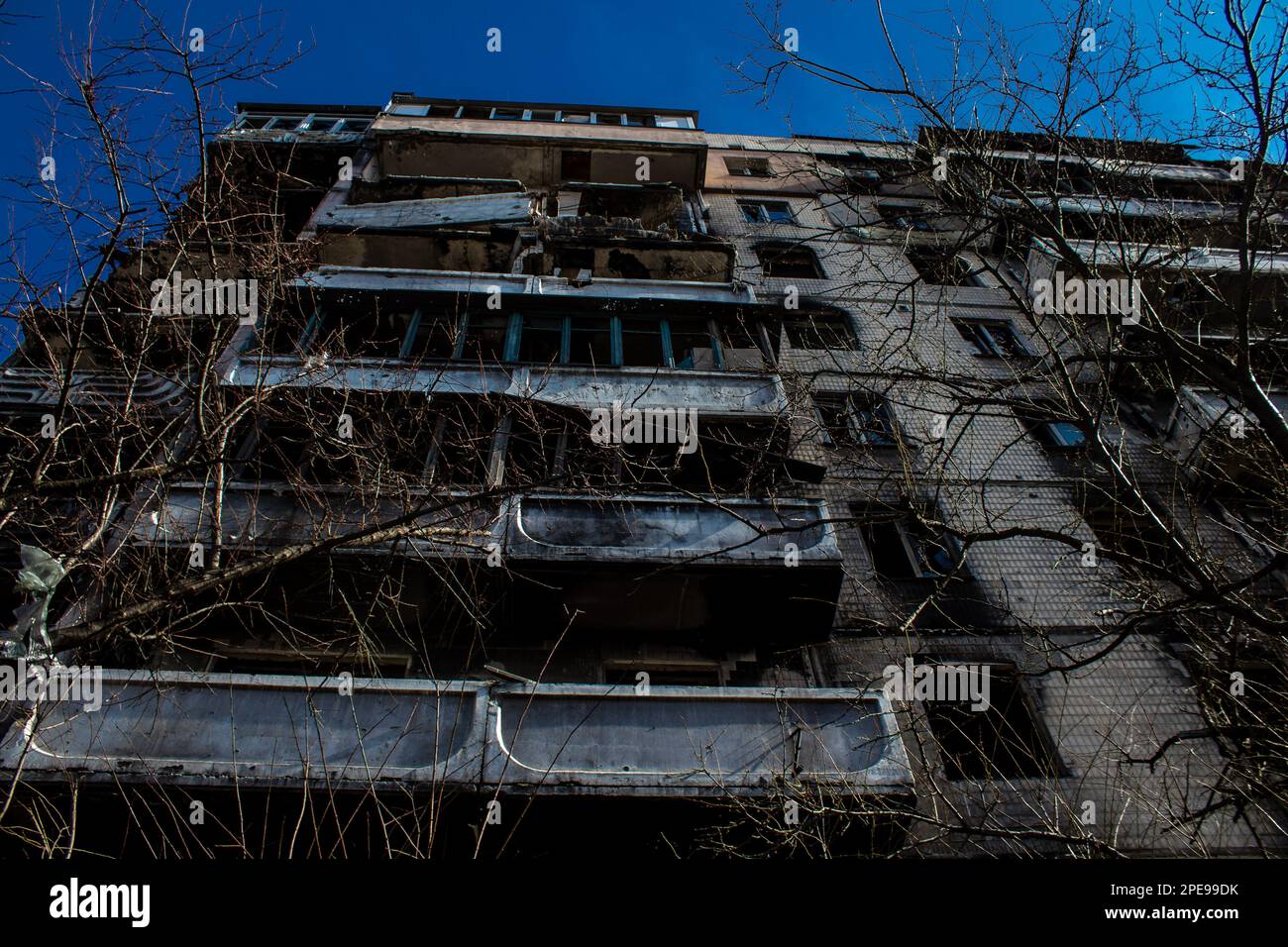 Close-up of the windows of the facade of a building that burned after ...