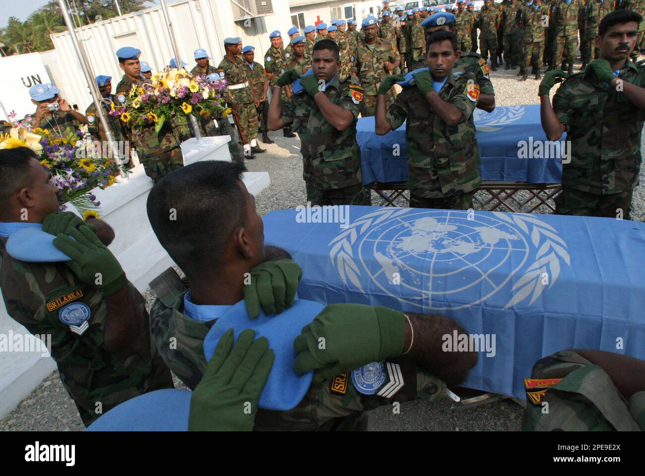 Sri Lankan U.N. peacekeepers perform a ceremony honoring two killed Sri ...