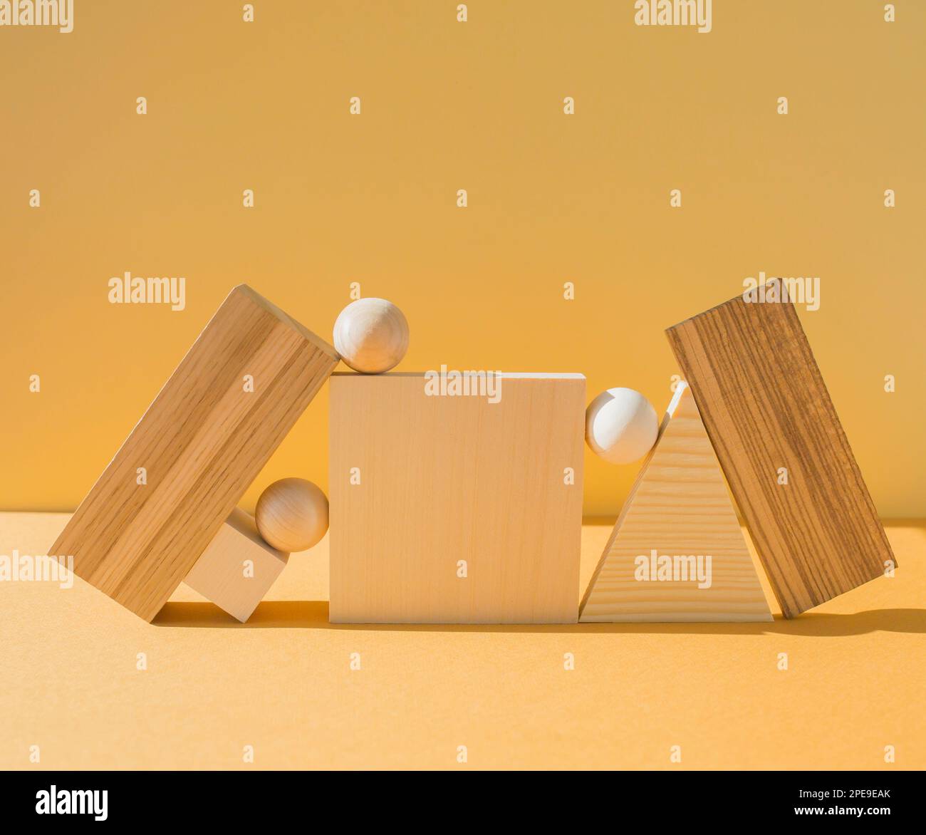 Geometrical figures composition. Three-dimensional wooden objects on ...