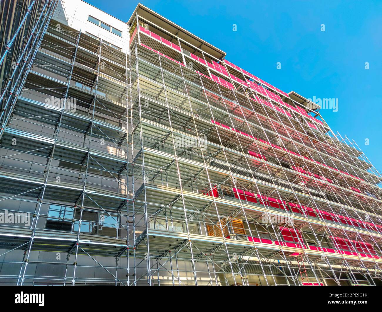 A temporary support structure made of scaffolding is commonly used in ...