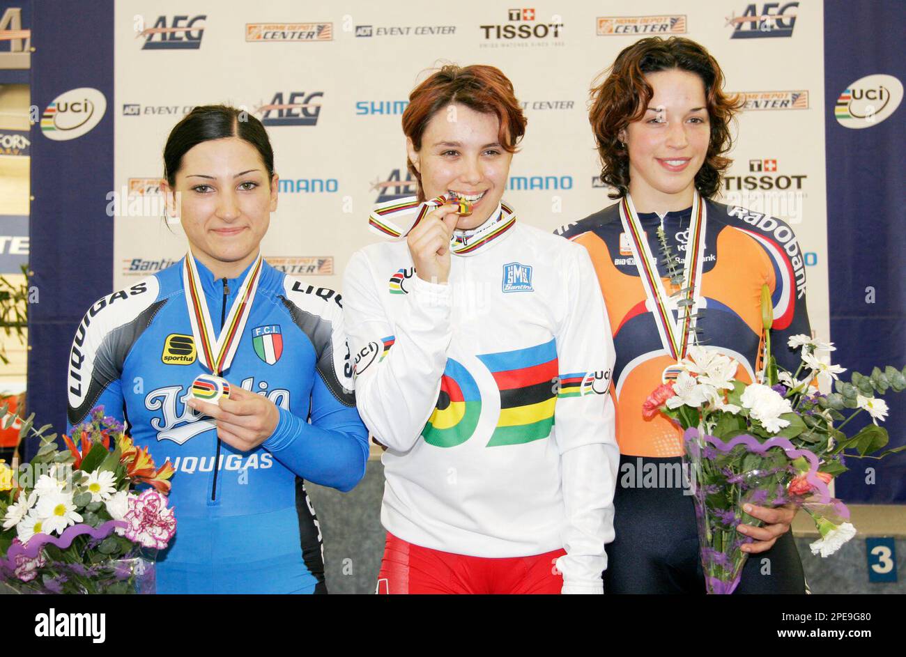 Clara Sanchez of France, center, poses with her gold medal in the women ...