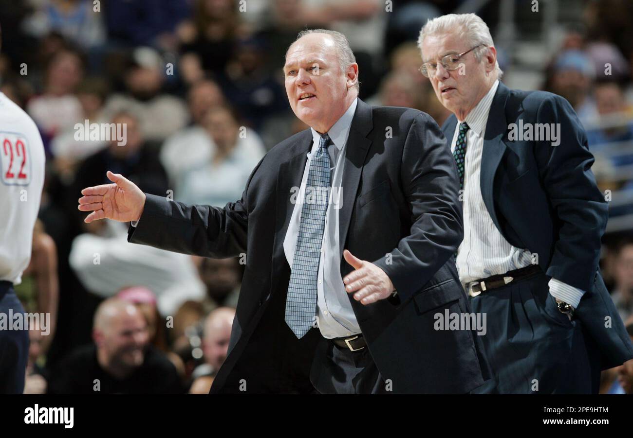 Denver Nuggets coach George Karl, center, and assistant coach Doug Moe ...
