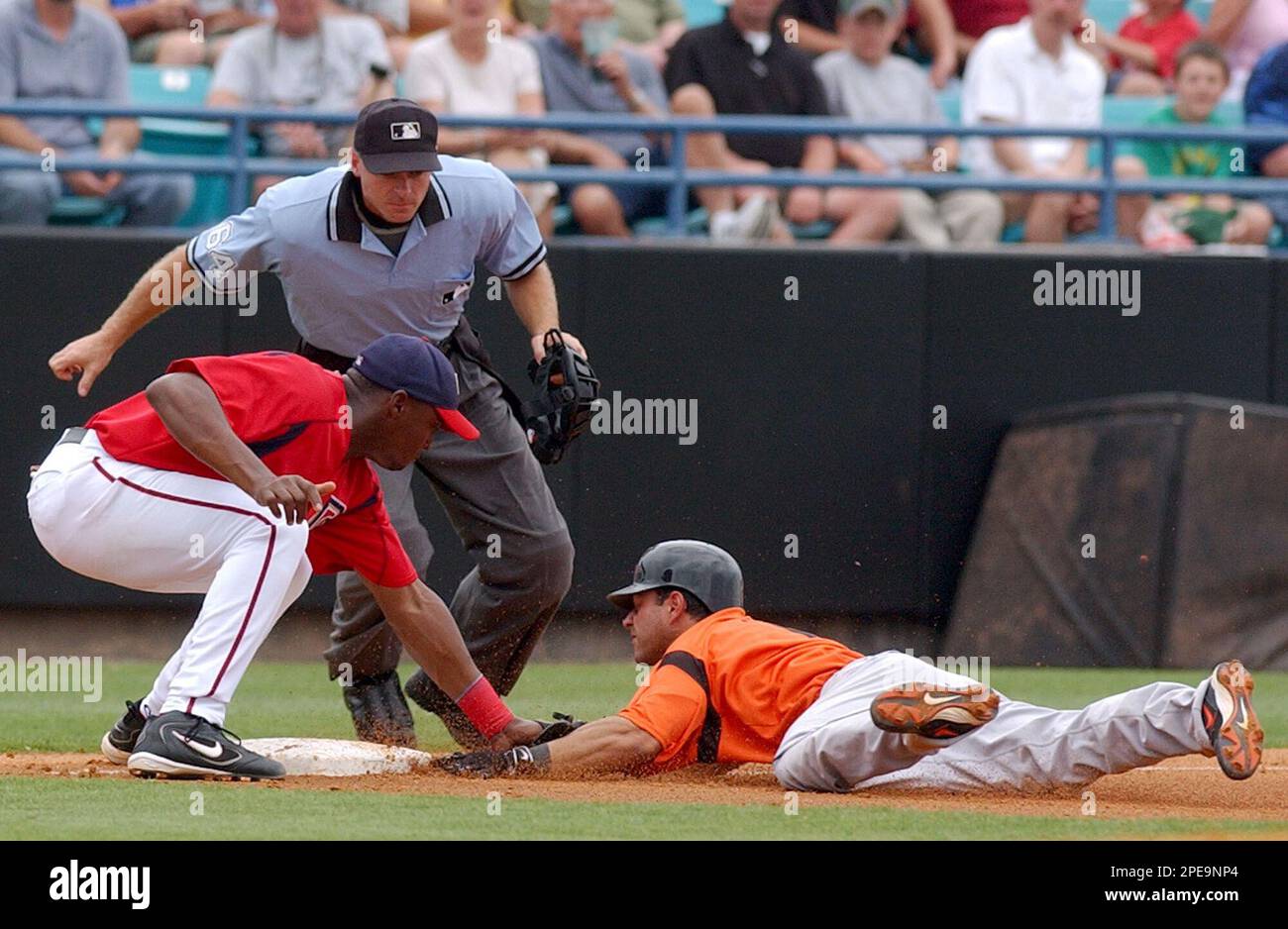 Washington Nationals third baseman Tony Blanco, left, tags out ...