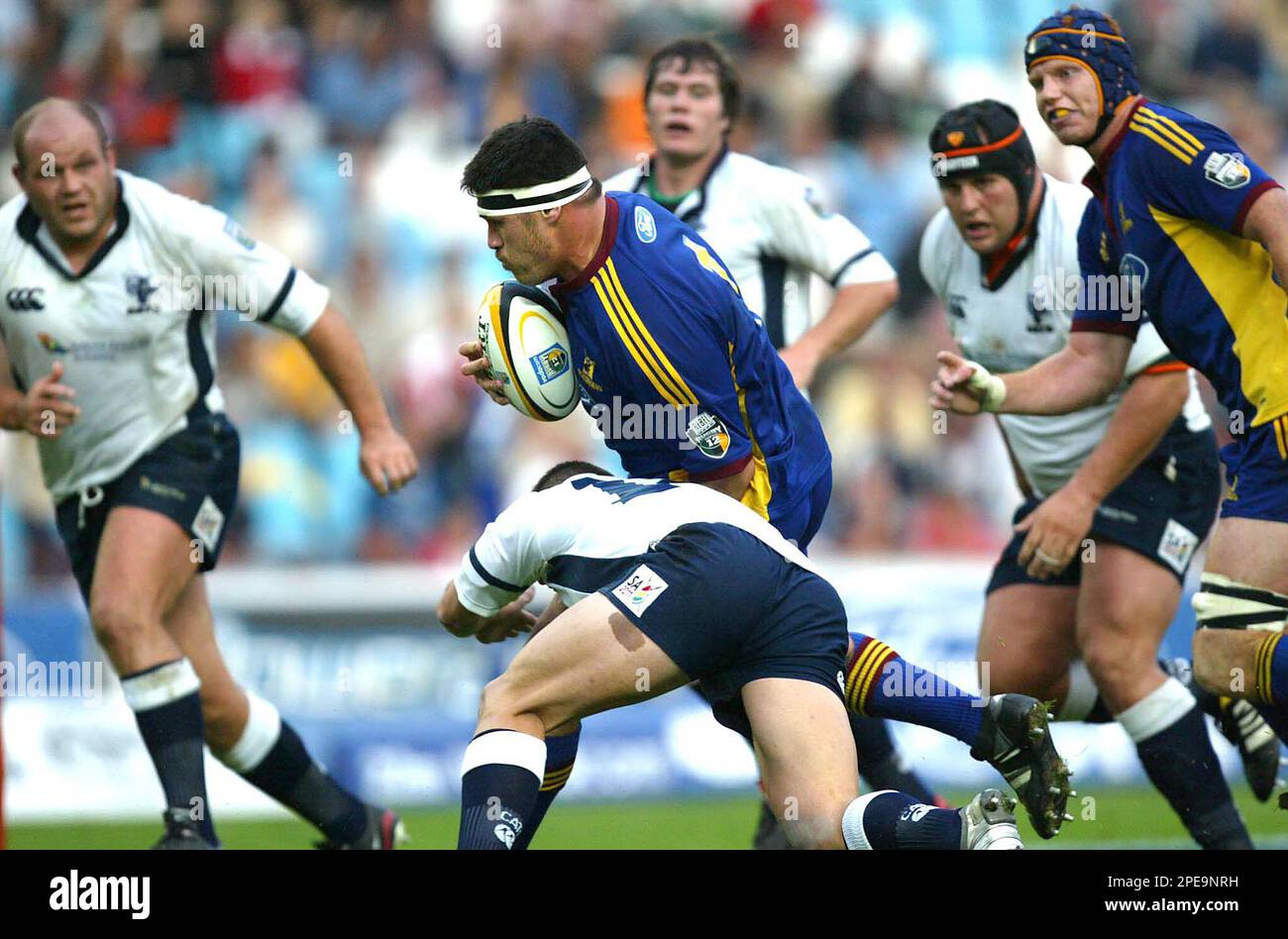 New Zealand Highlander's, Carl Hoeft, with ball, lumbers toward the ...