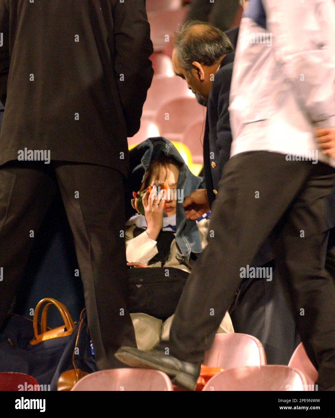 A Japanese female fan, whose eye was injured by Iranian fans throwing ...