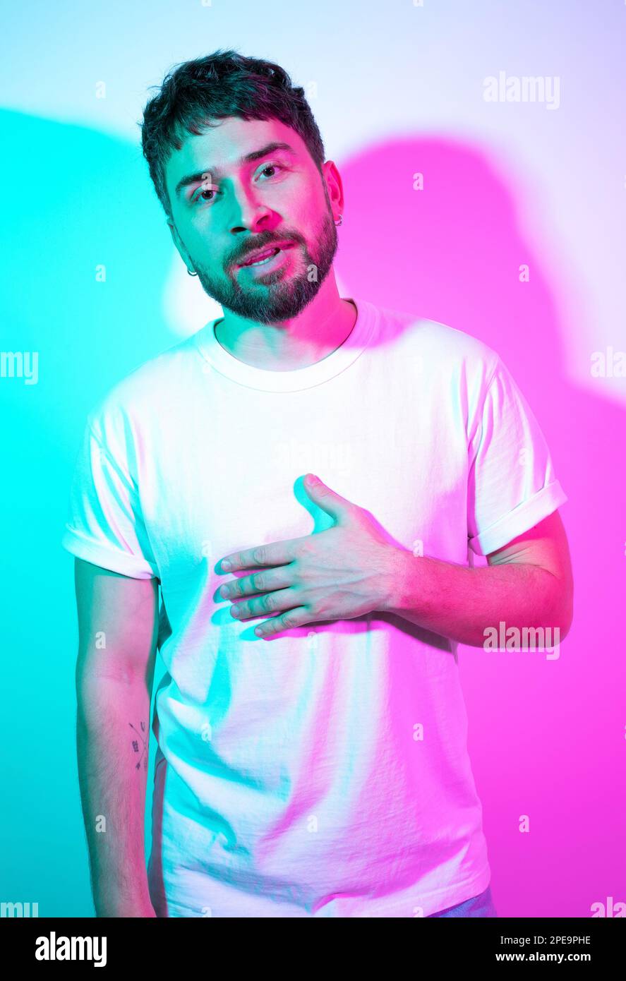 Artistic creative portrait bearded middle age man in white t-shirt in a ...