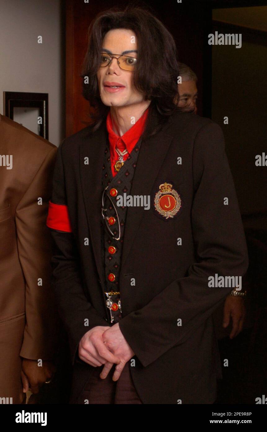 Michael Jackson exits the courtroom at the Santa Barbara County ...