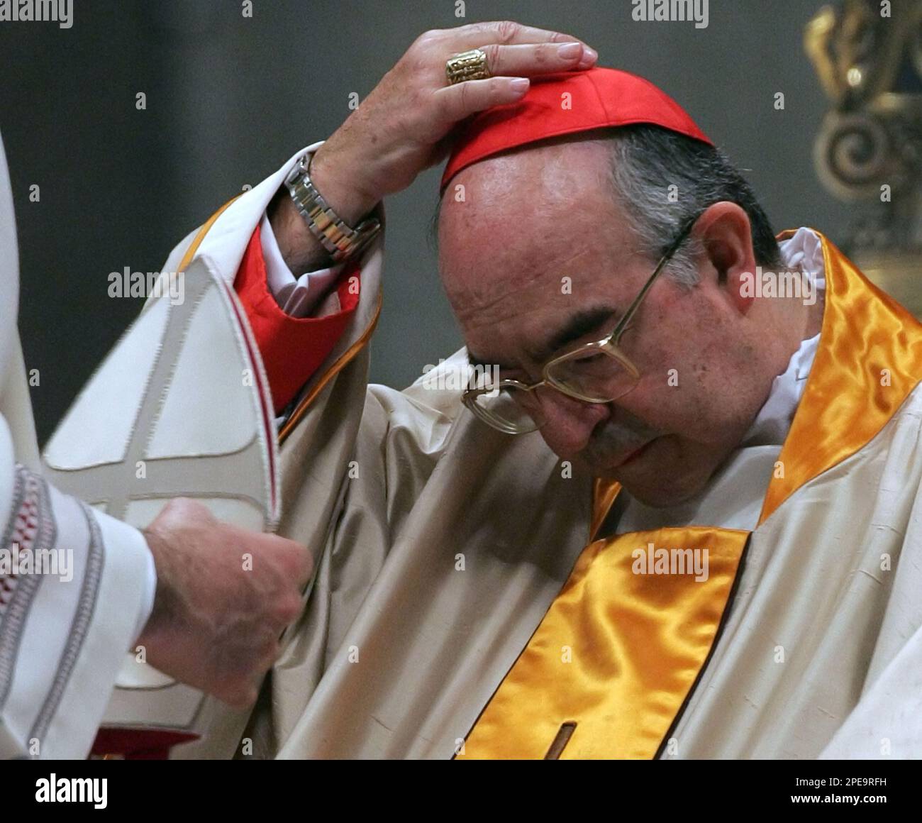 Cardinal Alfonso Lopez Trujillo, right, adjustes his skull cap during ...