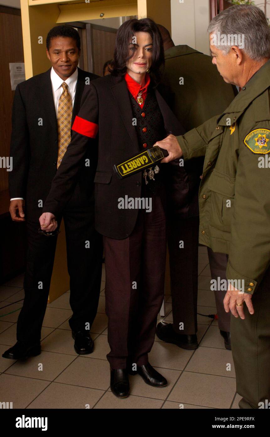 Michael Jackson,center, arrives at the Santa Barbara County Courthouse ...