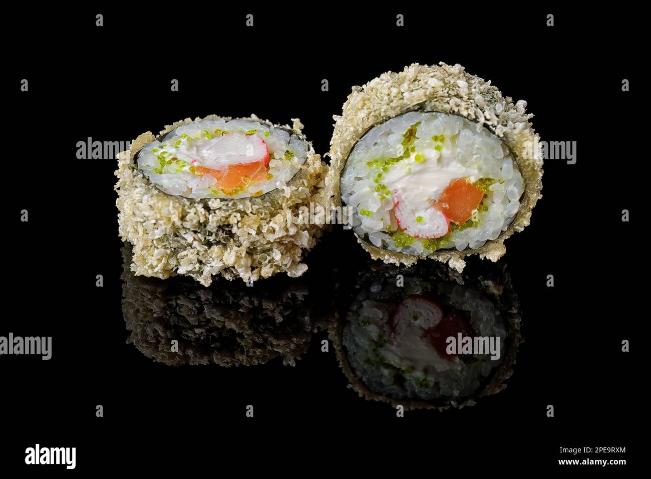 warm sushi roll with salmon, cream cheese, crab and flying fish roe, on ...