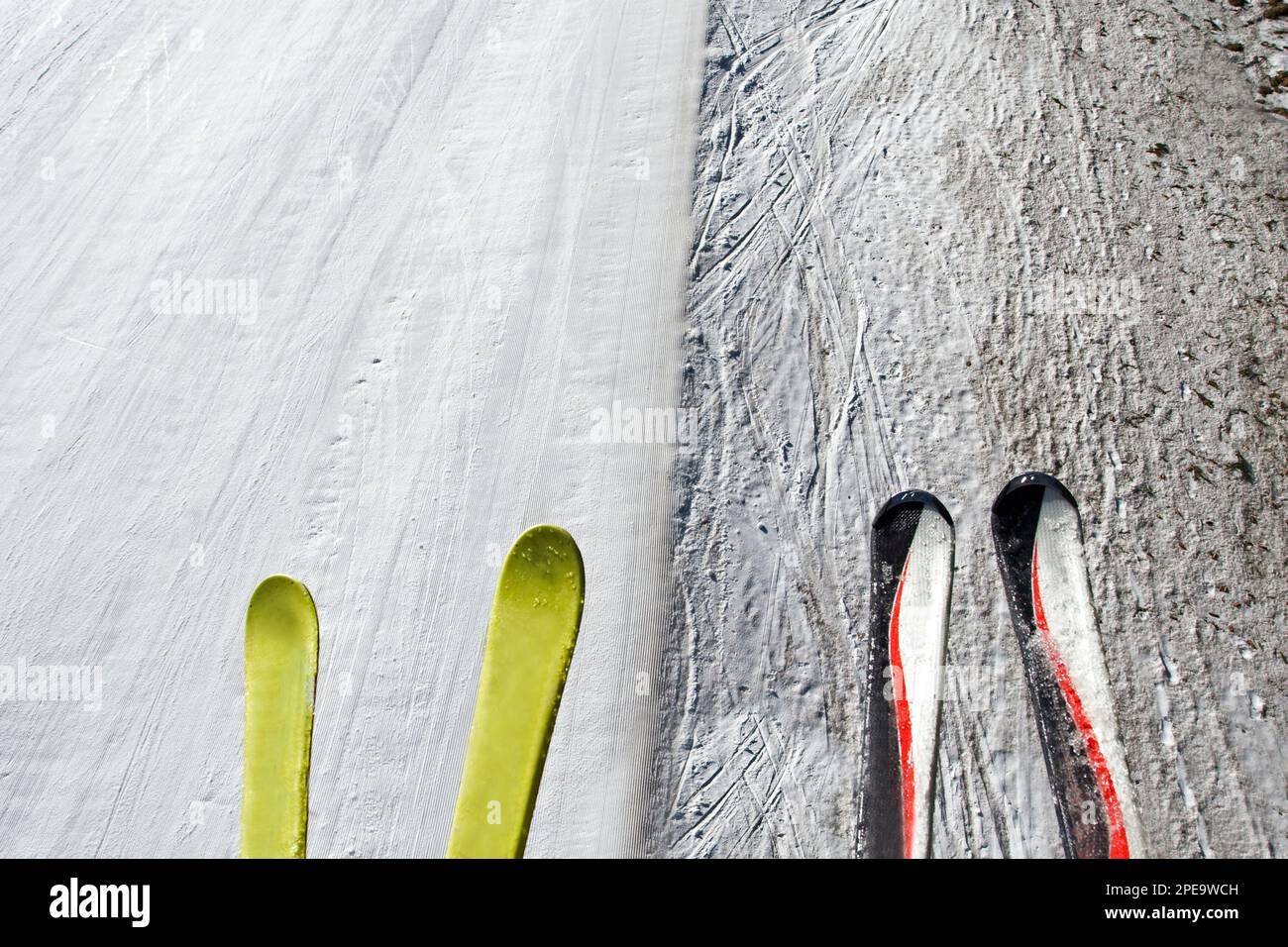 Two pairs of skis on the slope Stock Photo - Alamy