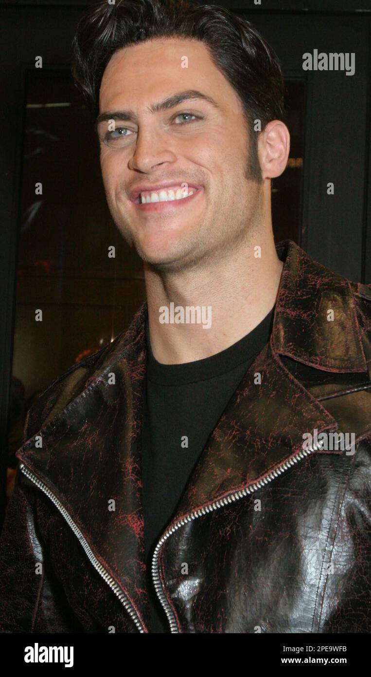 Cheyenne Jackson poses for photographers before a preview performance ...