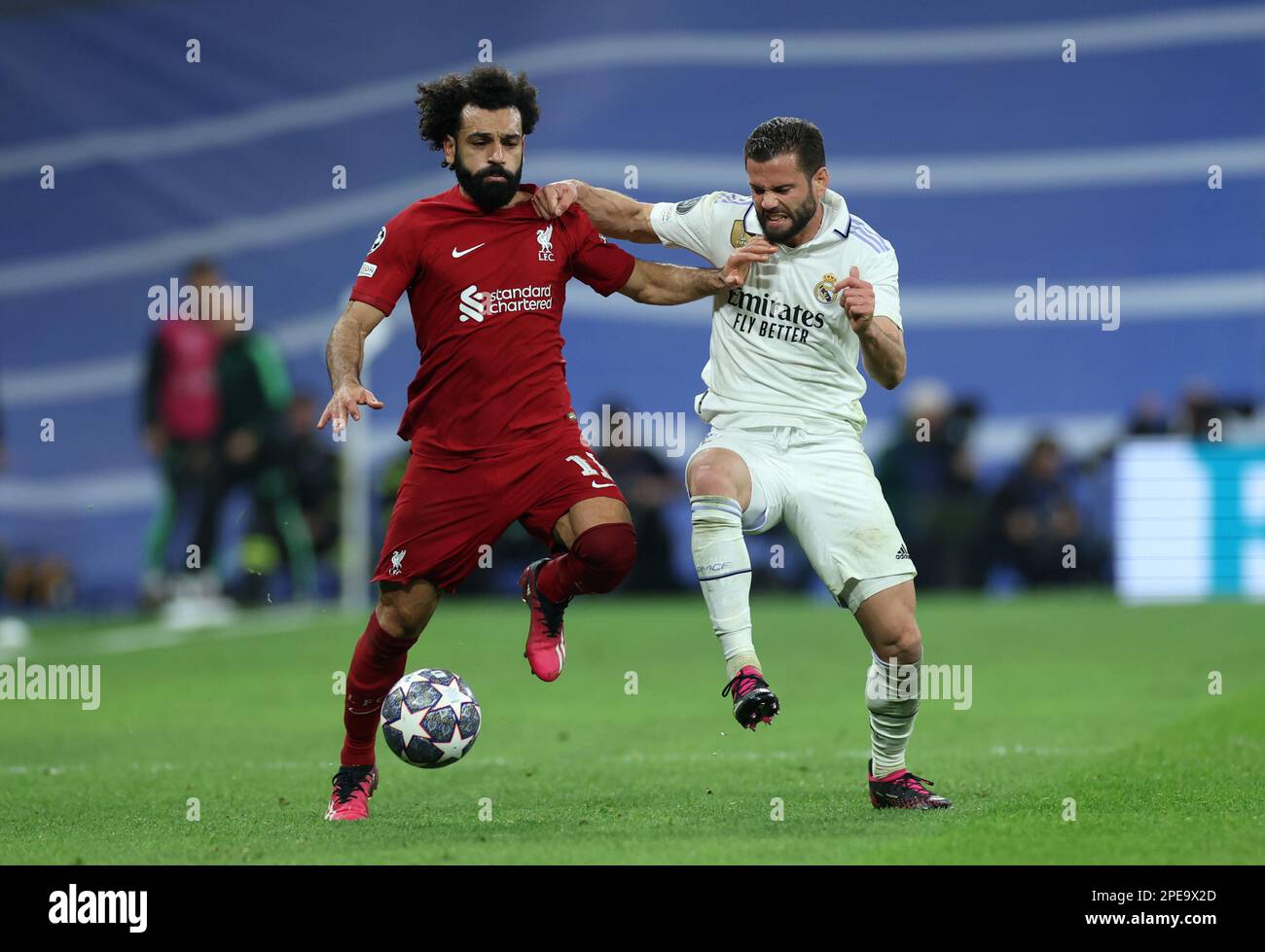Liverpool's Mohamed Salah (left) and Real Madrid's Nacho Fernandez ...