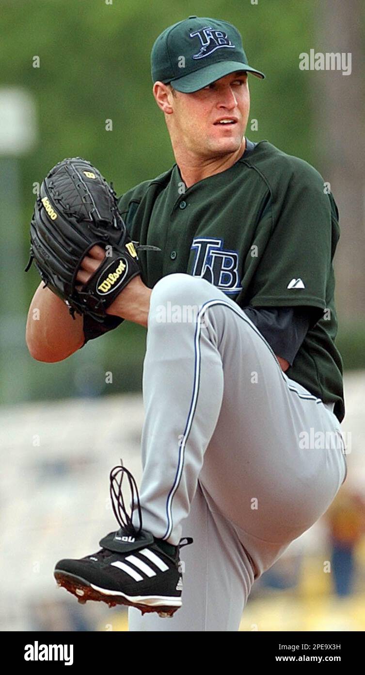 Tampa Bay Devil Rays starting pitcher Rob Bell winds up in the first ...