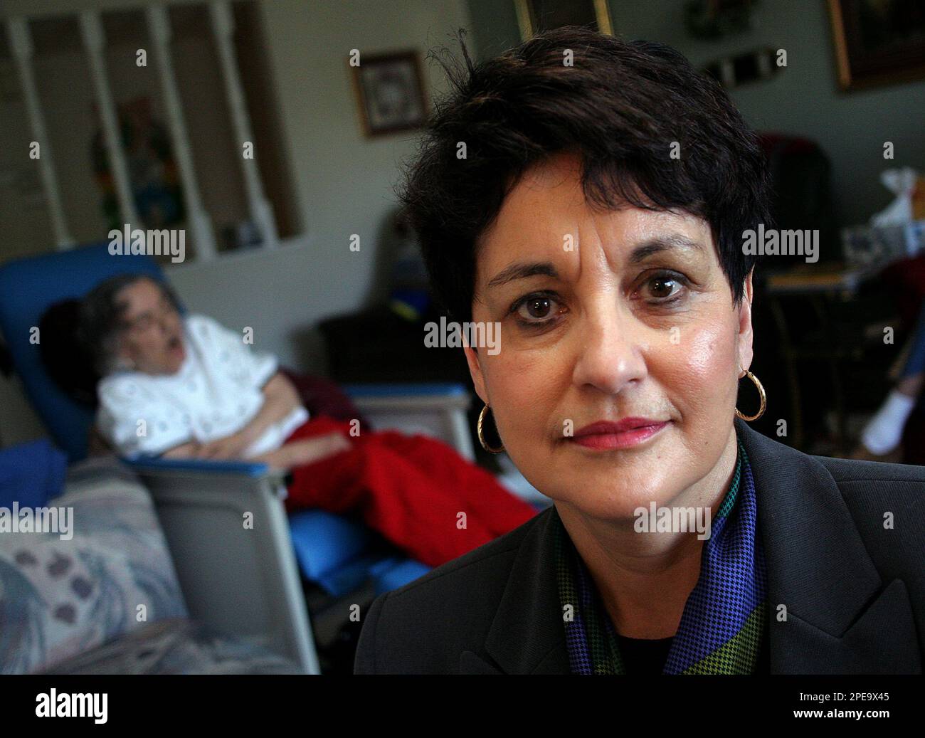 Bonnie Morgan, 55, of Mesa, Ariz., visits her 87-year-old mother Katie ...