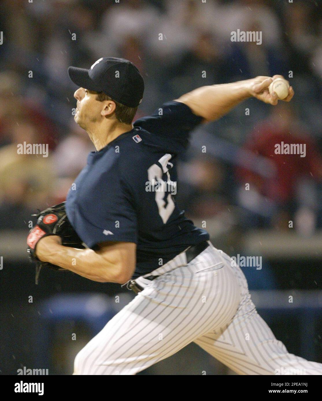 New York Yankees pitcher Kevin Brown winds up for a pitch in the third ...