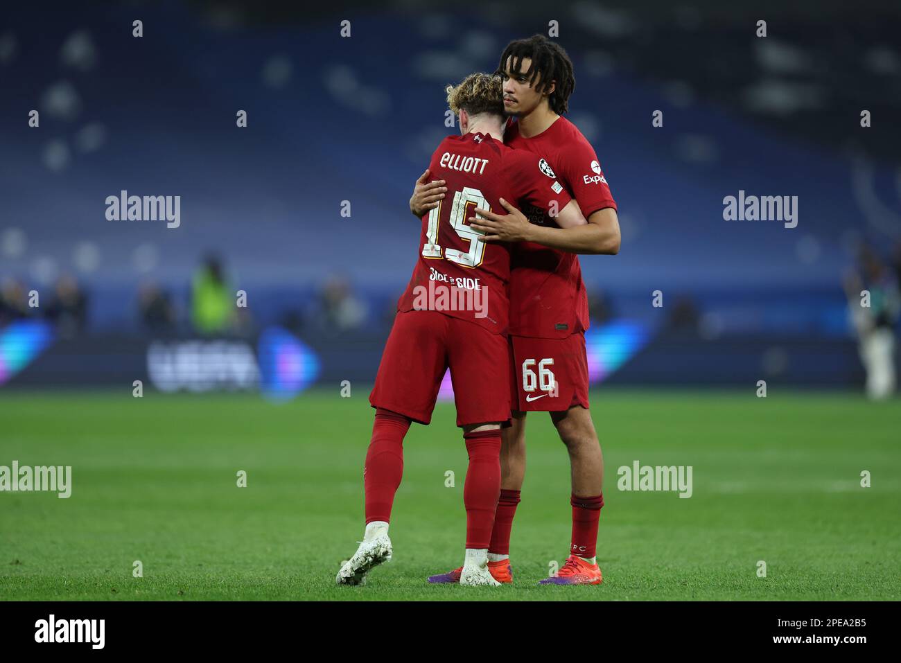 Liverpool's Harvey Elliott (left) and Trent Alexander-Arnold embrace ...