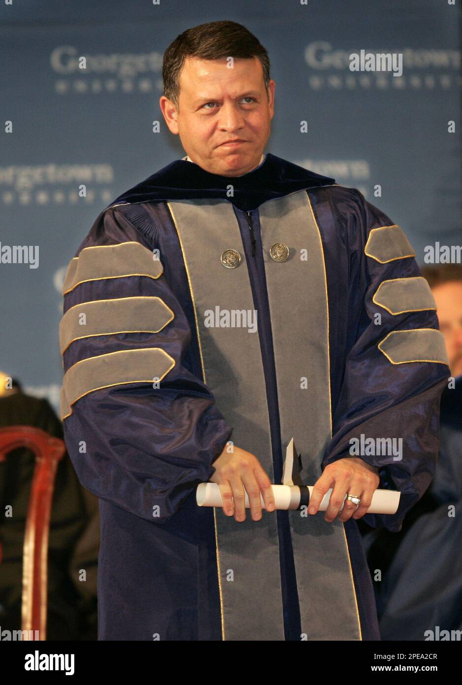 Jordan's King Abdullah holds his honorary doctorate of humane letters ...