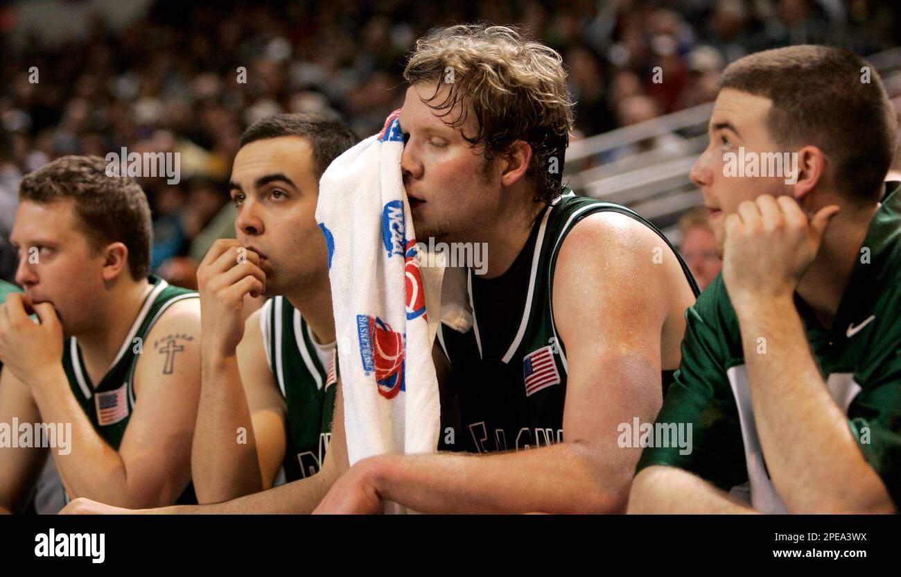 The Vermont bench is shown during their second-round NCAA tournament ...