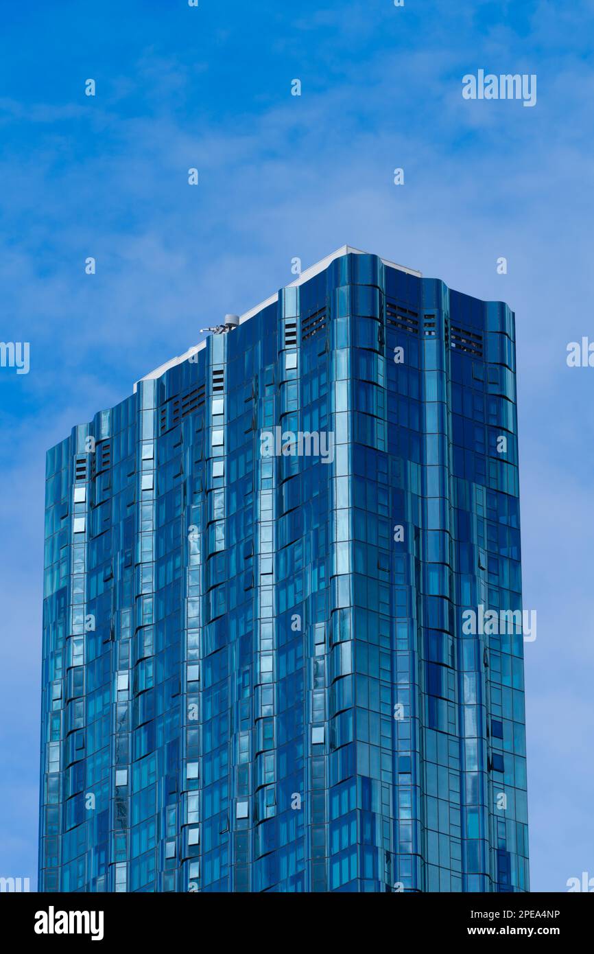 Glass office building architecture showing window patterns with light ...
