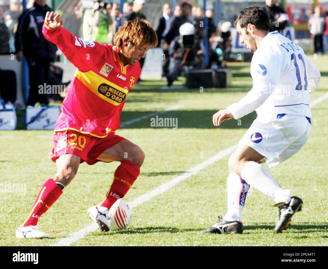 Messina's Atsushi Yanagisawa, of Japan, left, and Bologna's Claudio ...