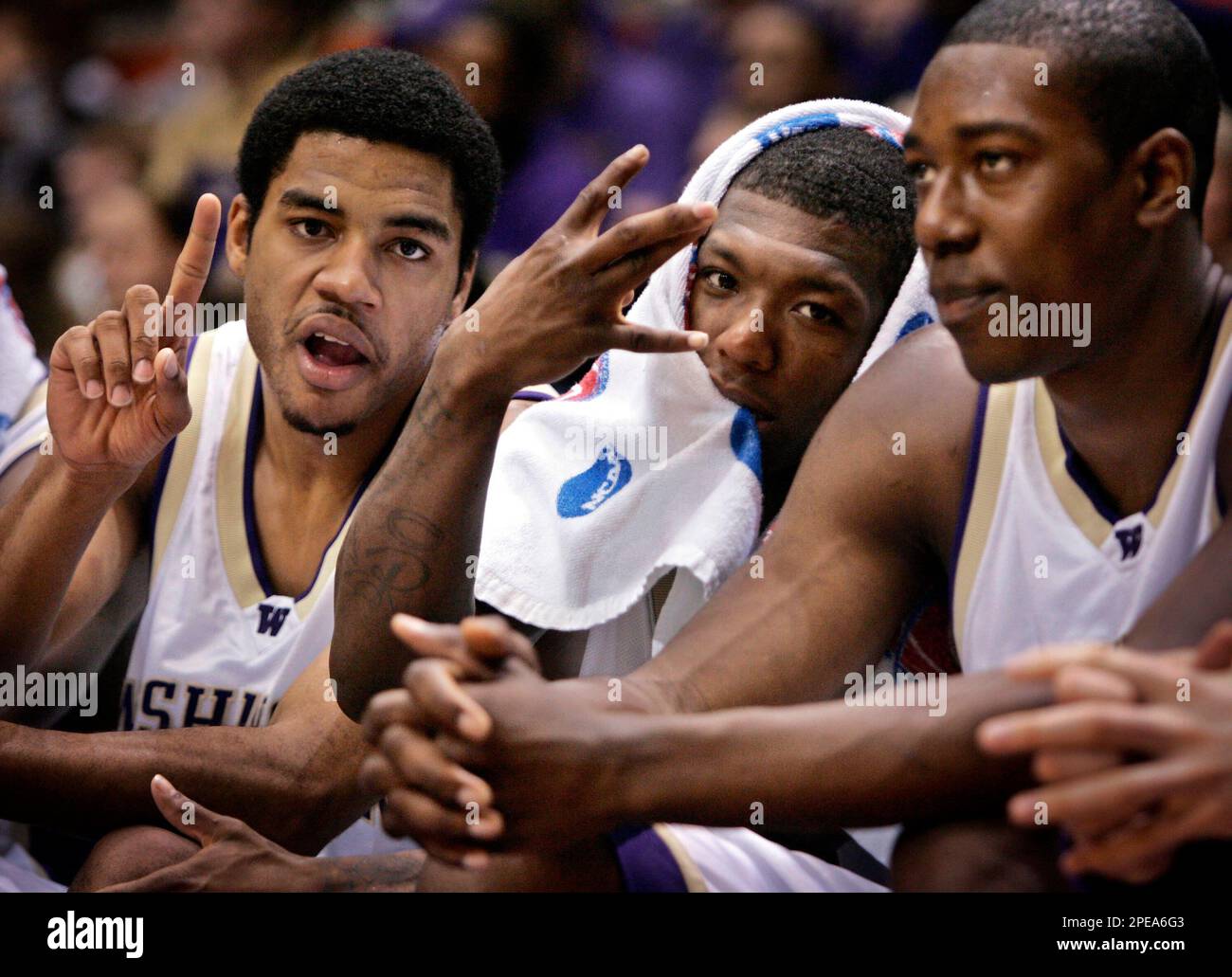 Washington's Joel Smith, left, Nate Robinson, center, and Hakeem ...