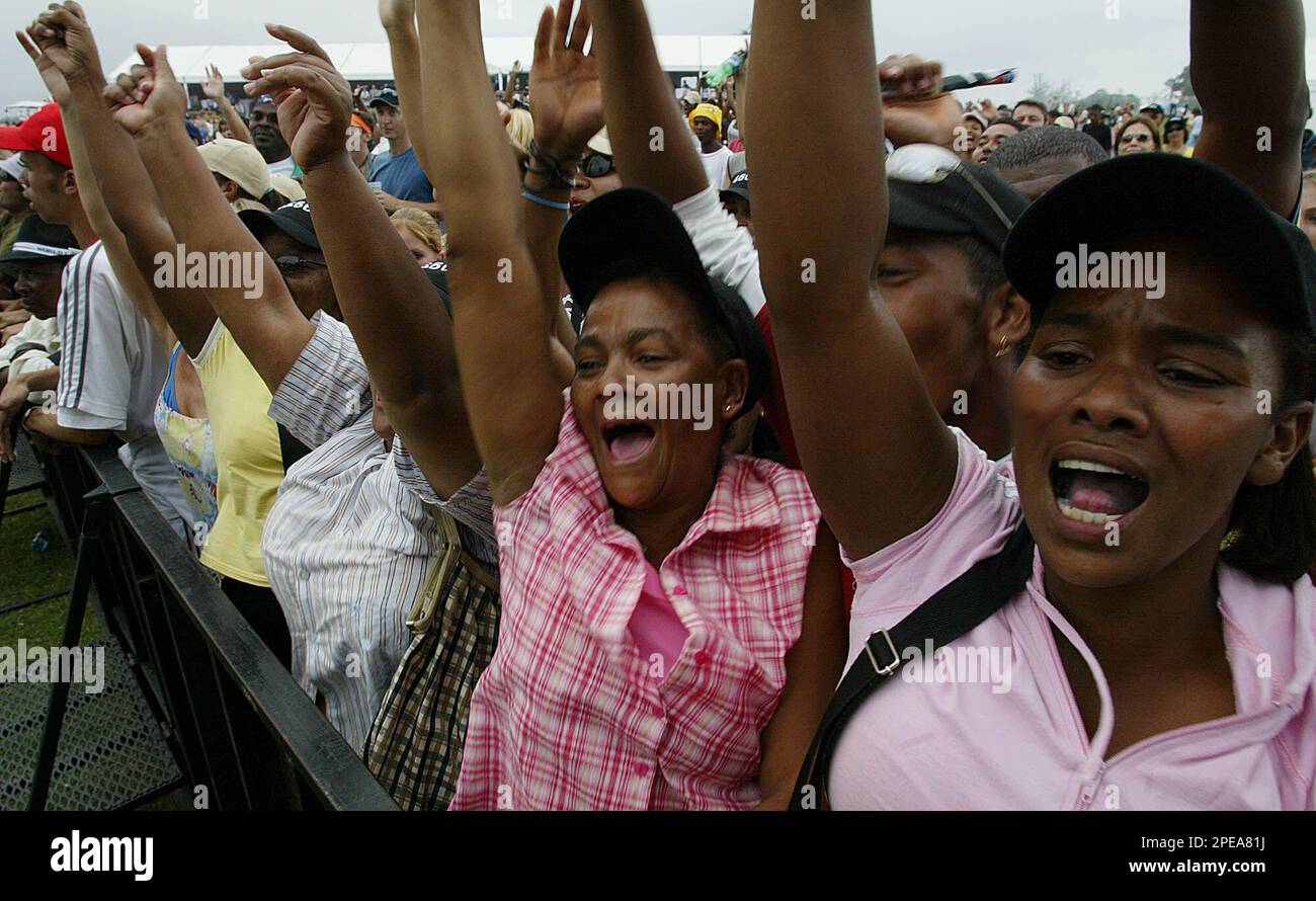 Emotional fans shout during the Nelson Mandela Foundation "46664" HIV ...