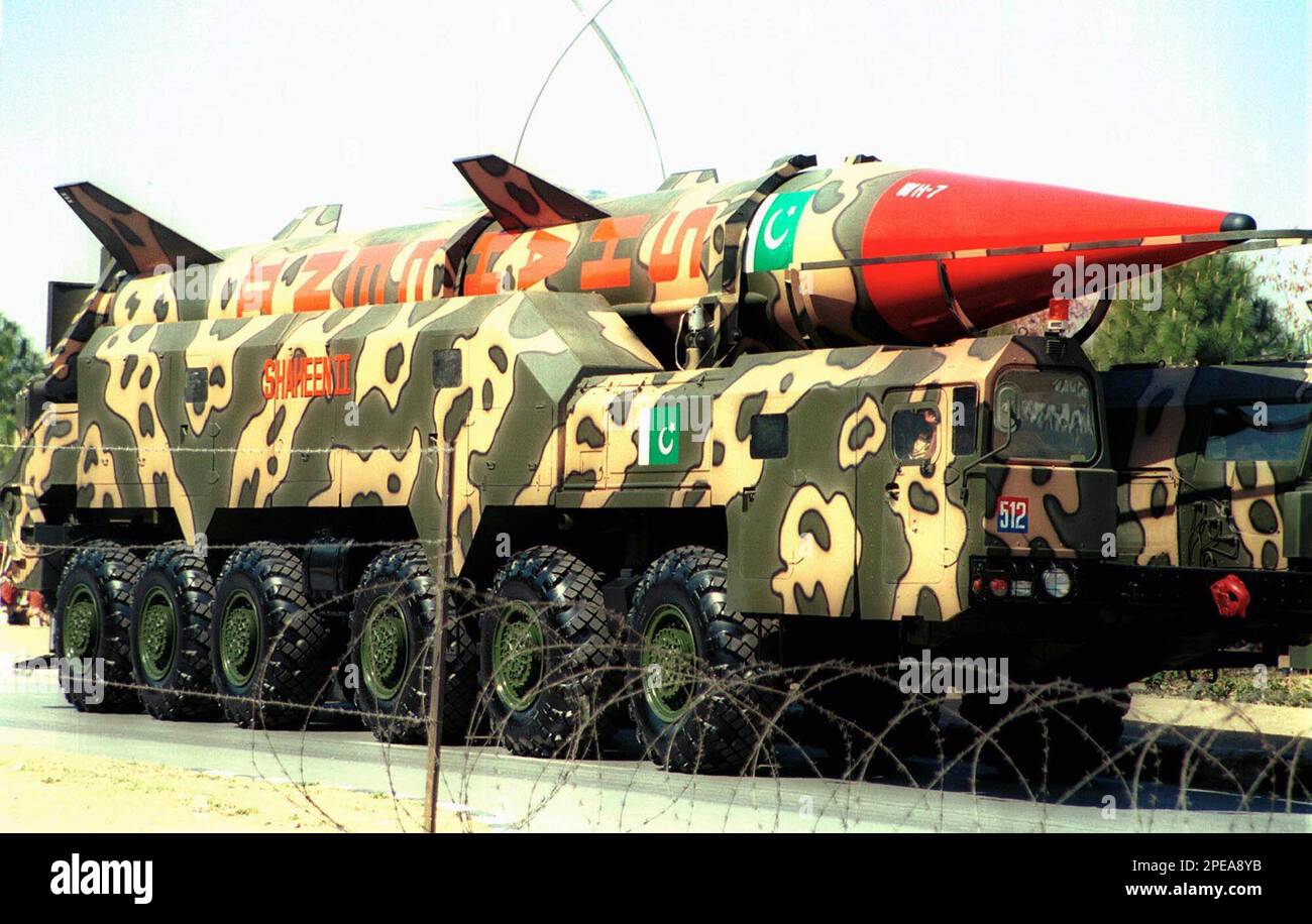 ** FILE ** A Pakistani-made Shaheen II missile rolls down a street ...