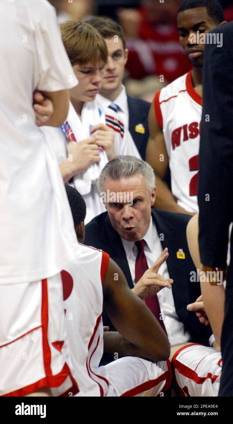 Wisconsin coach Bo Ryan talks to his team during a timeout against ...