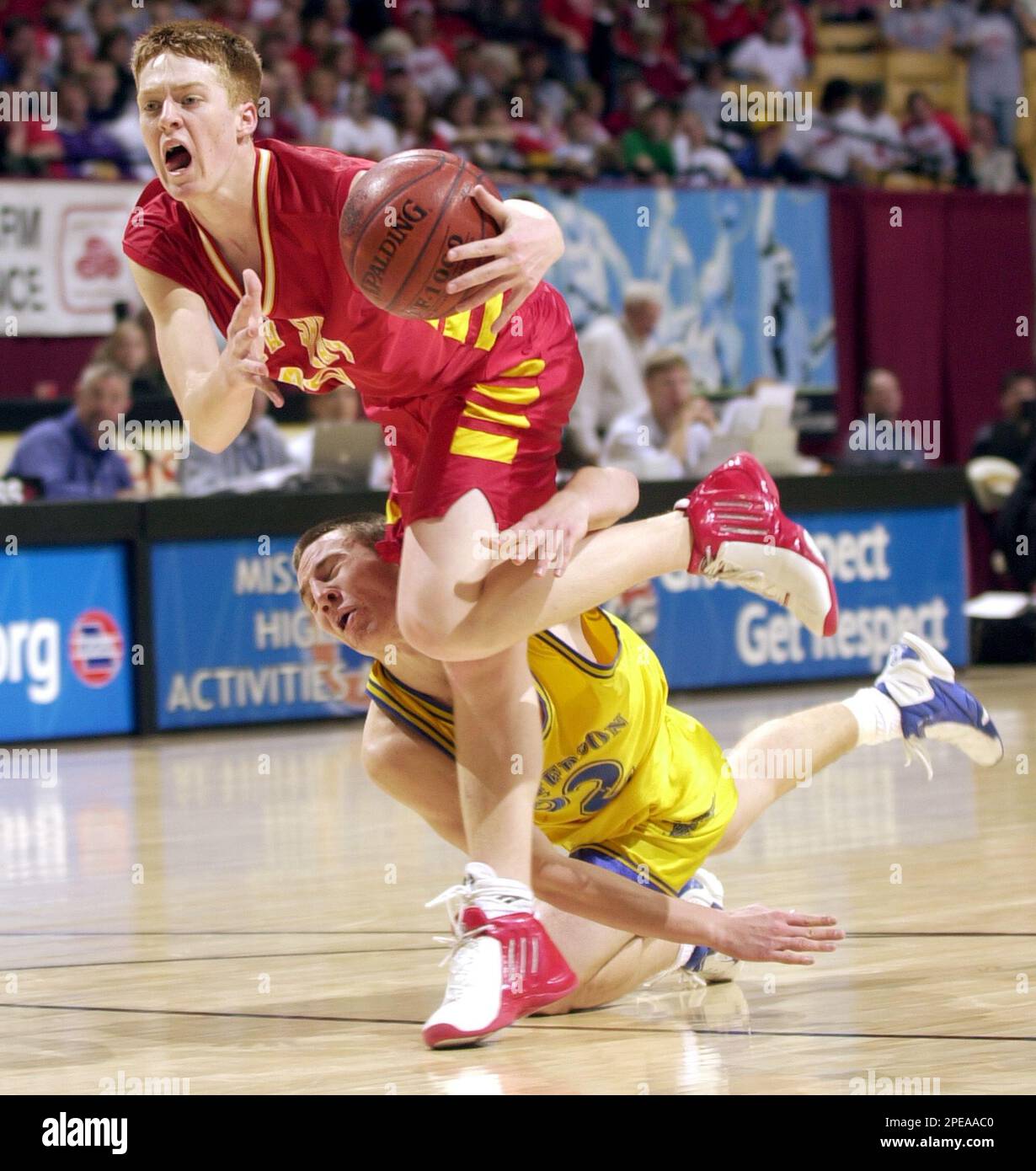 North Shelby's Chris Perry, left, is fouled by Jefferson's Todd Mattson ...