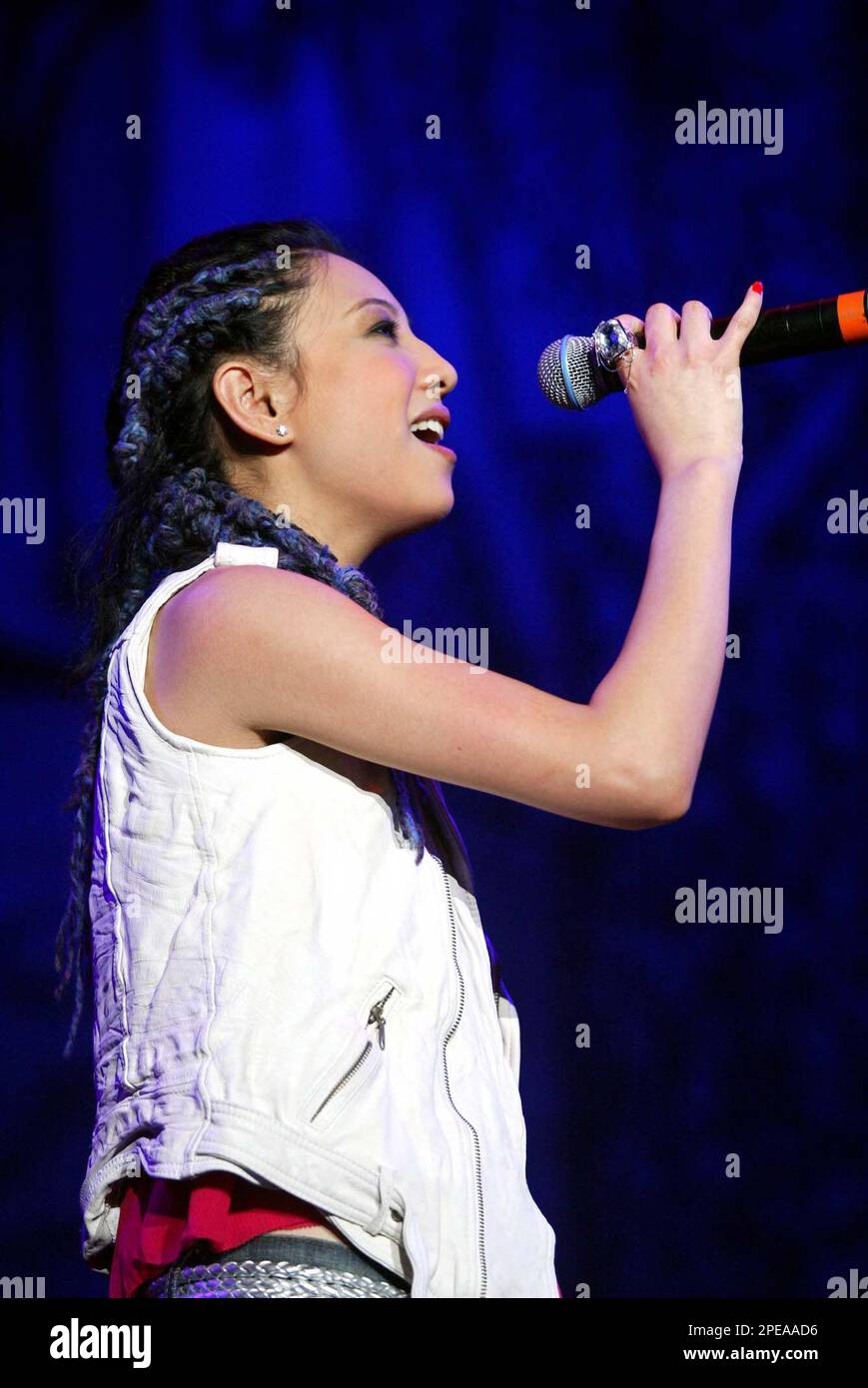 Hong Kong singer Yumiko Cheng sings at the charity concert for tsunami ...
