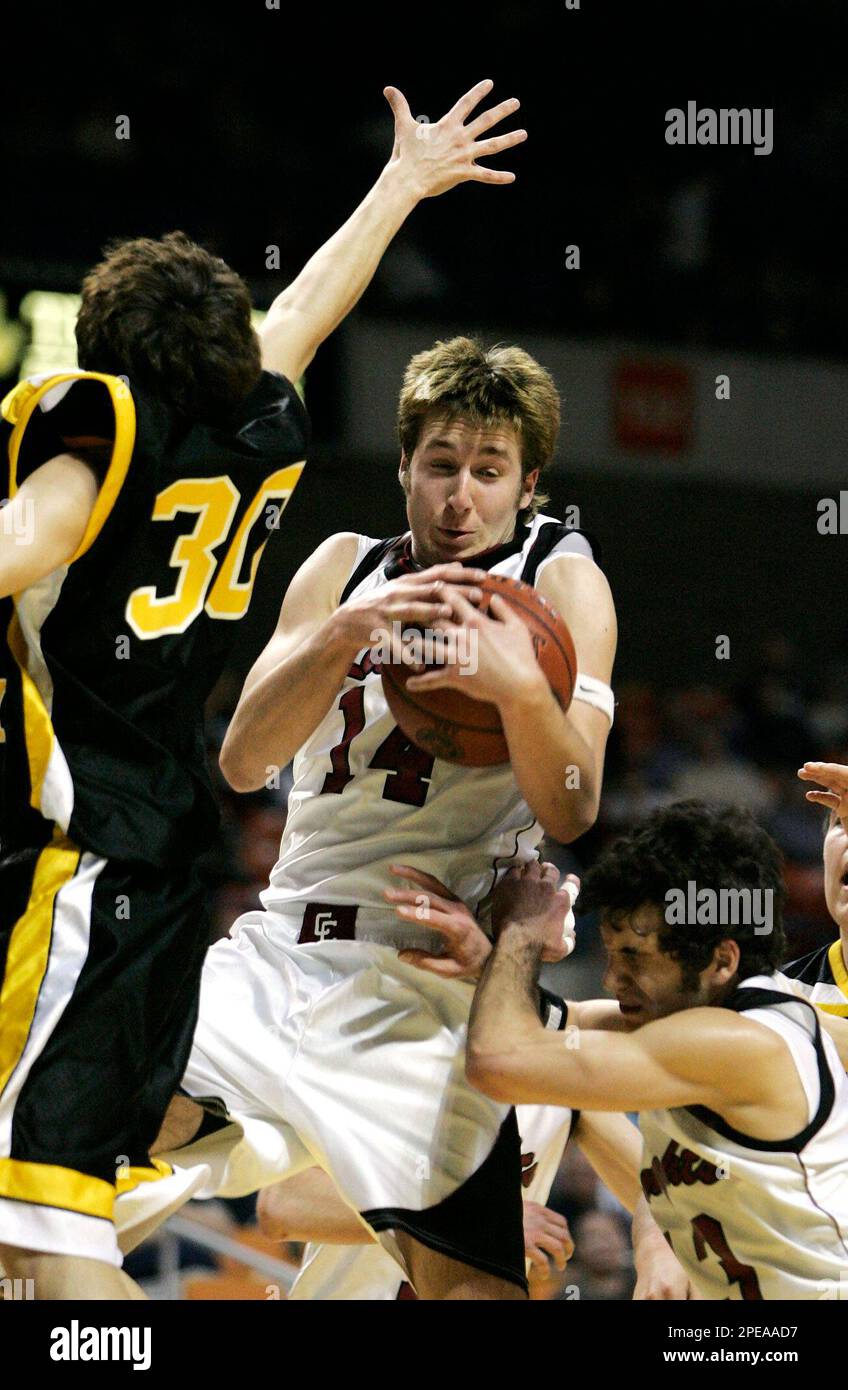 Wheeling Central's Eric Novick, center, collides with teammate Nathan ...