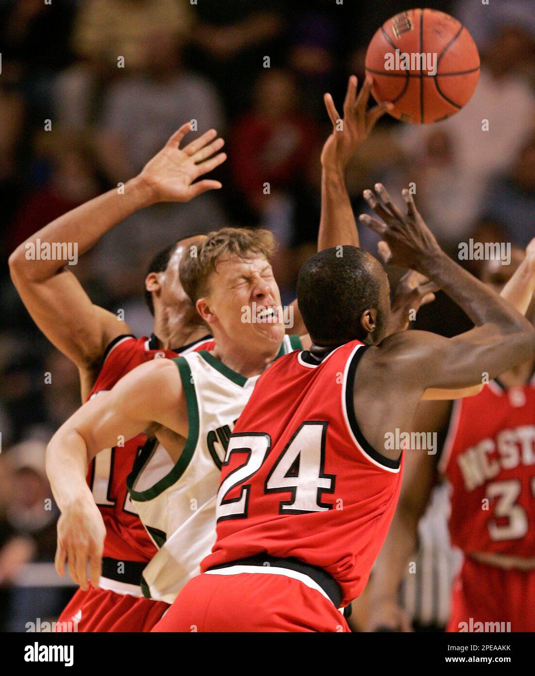 North Carolina's Julius Hodg (24) fights for a loose ball with ...