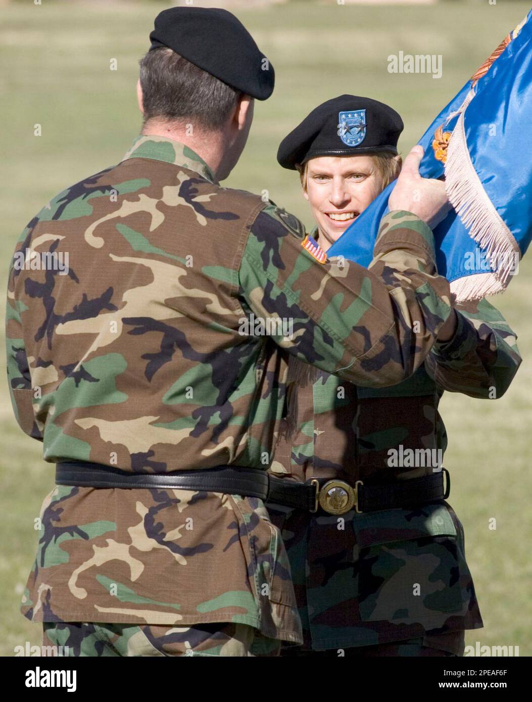 Gen. Kevin Byrnes, left, passes the colors of his post to Maj. Gen ...
