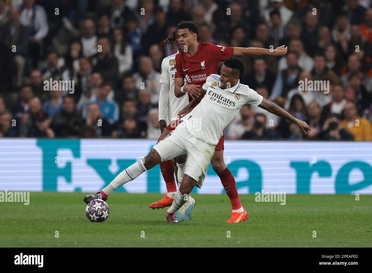 Madrid, Spain. 15th Mar, 2023. Cody Gakpo of Liverpool FC tussles with ...