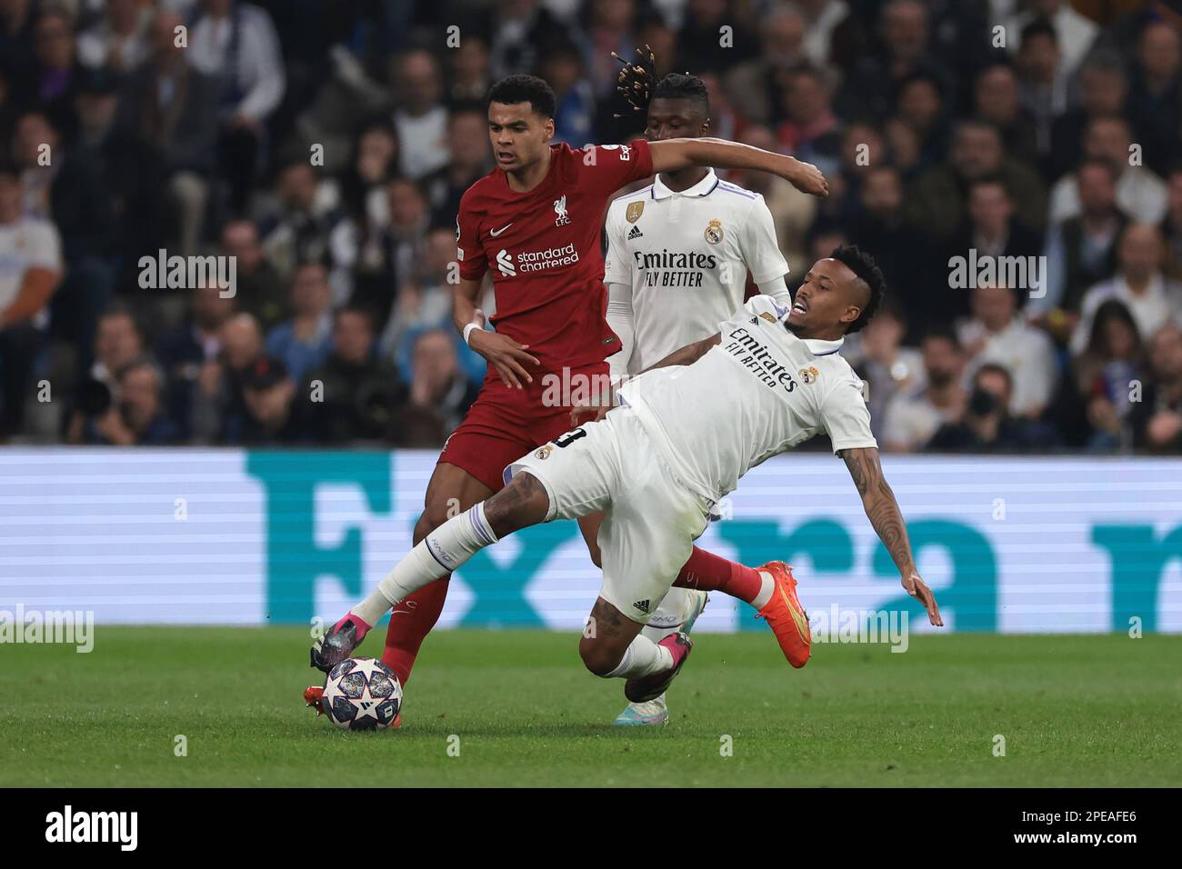 Madrid, Spain. 15th Mar, 2023. Cody Gakpo of Liverpool FC tussles with ...
