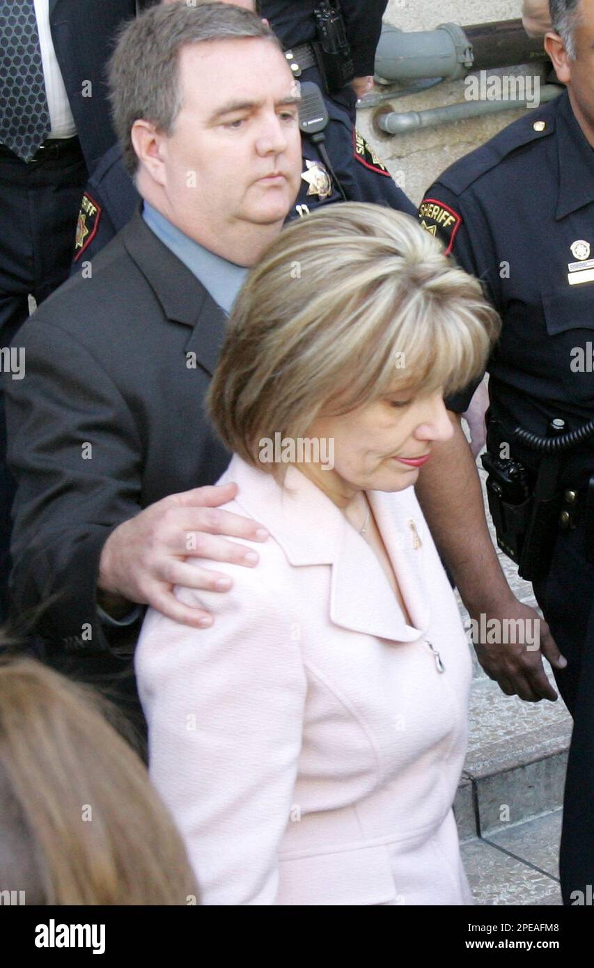 Sharon Rocha, mother of Laci Peterson, is escorted by Lt. Mark Smith ...