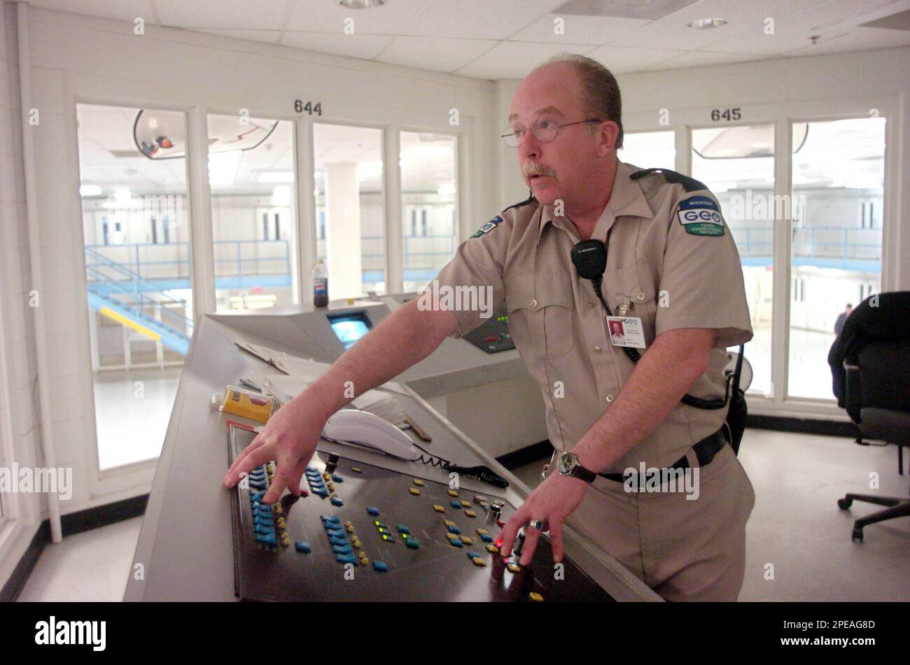 GEO employee Douglas Libby opens and closes the doors for inmates ...