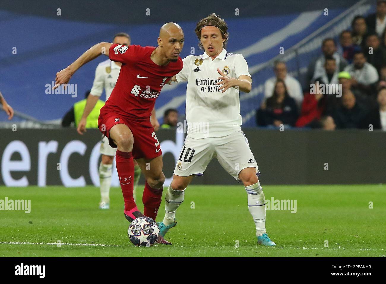 Madrid, Spain. 15 Mar, 2023. Liverpool´s Fabinho (L) and Real Madrid´s ...
