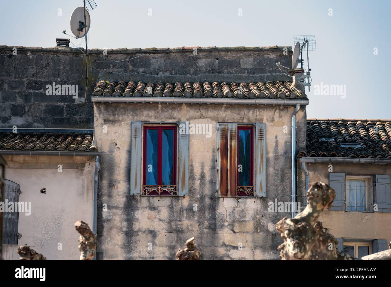 Windows with old metal shutter in a stone wall Stock Photo - Alamy