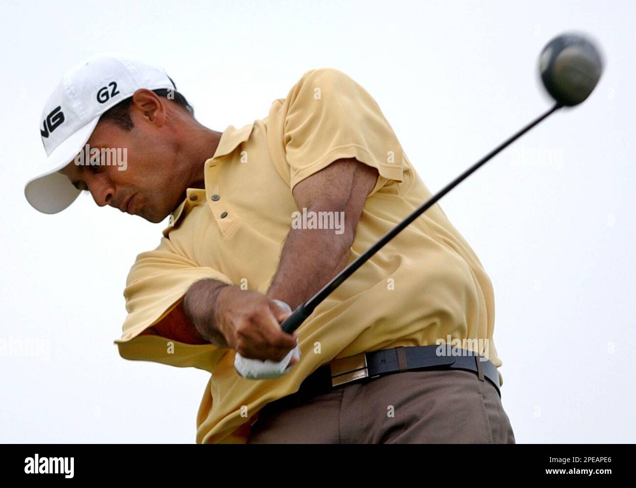 India's Arjun Atwal plays a ball on the 16th during the final day of ...