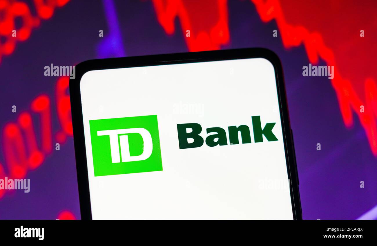 In this photo illustration the TD Bank logo seen displayed on a ...