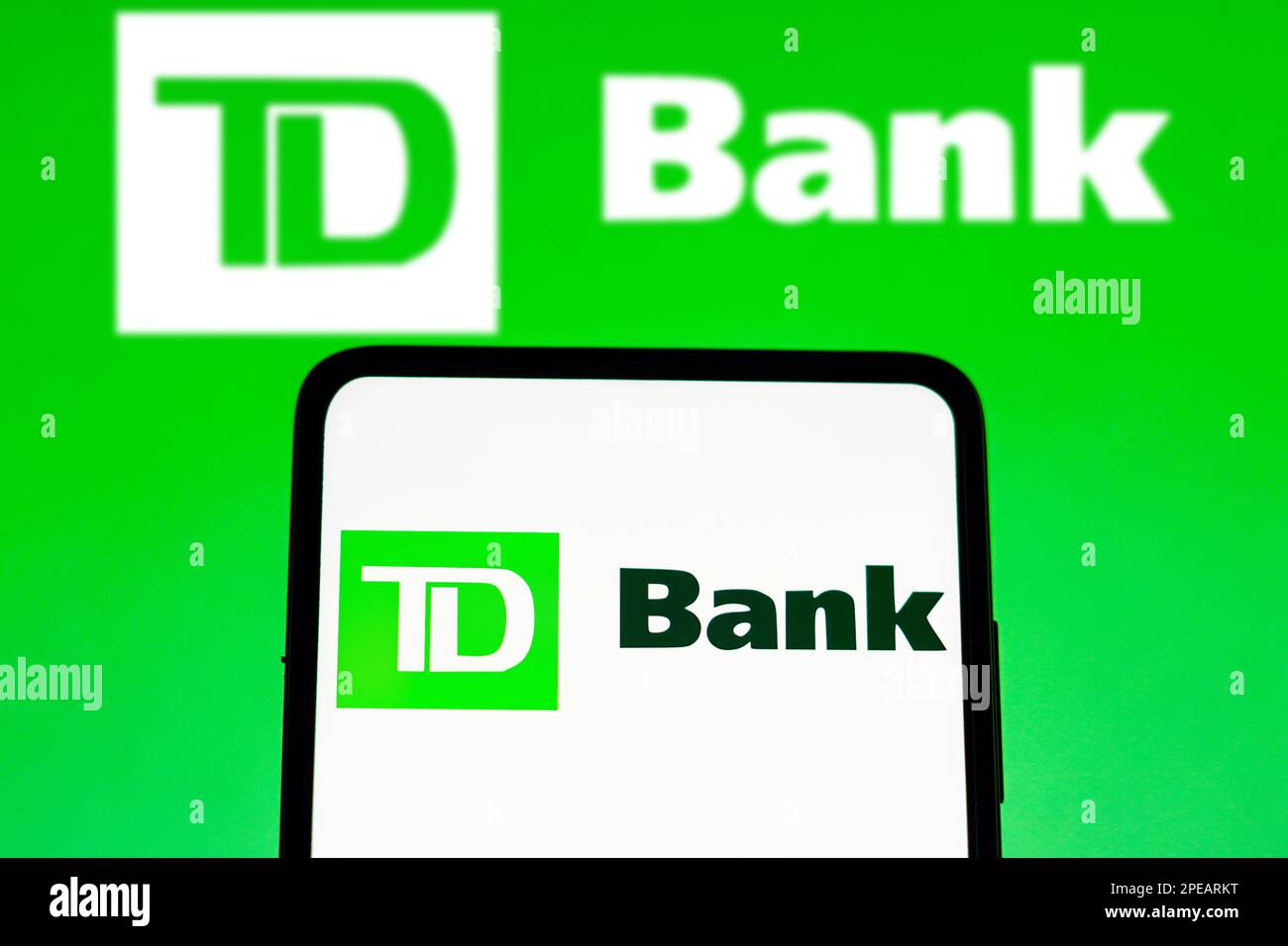 In this photo illustration, the TD Bank logo seen displayed on a ...